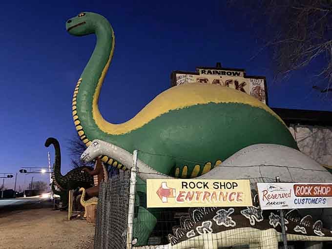 After dark, the brontosaurus glows under the night sky like a prehistoric neon sign.