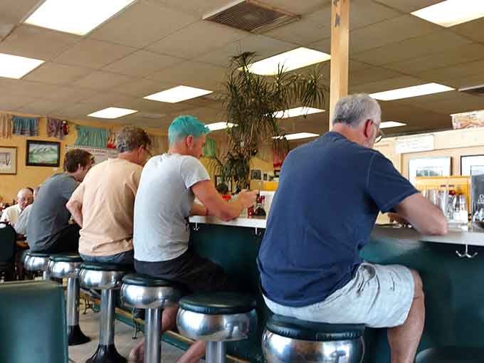 Counter seats full, shoulders relaxed, nobody staring at a phone. Dot's has that rare power.