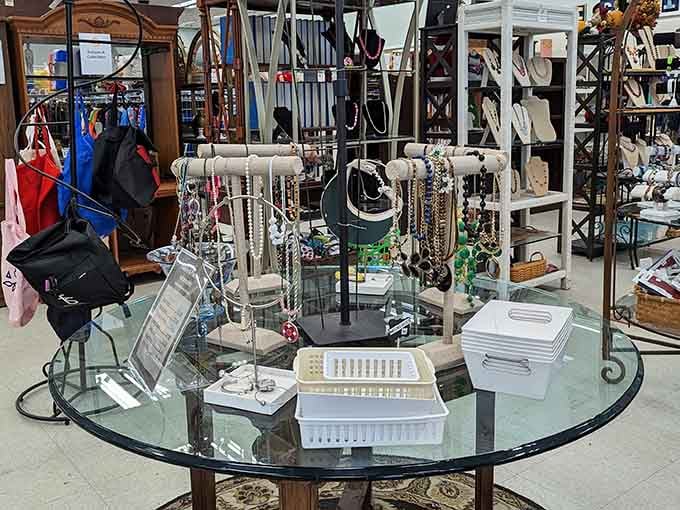 A glass display table full of jewelry and accessories, because the perfect finishing touch shouldn't cost a fortune.