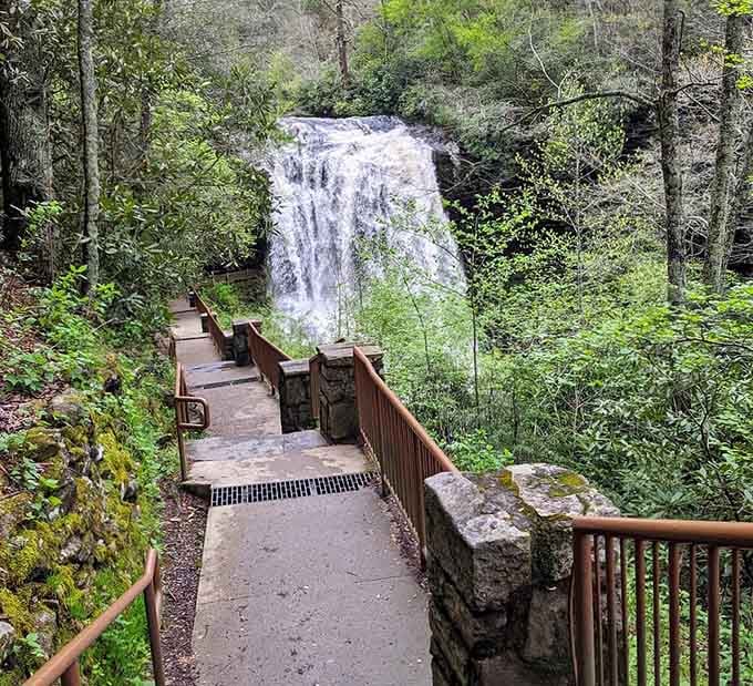 A paved path and stone steps mean the waterfall does all the dramatic work, not your knees.