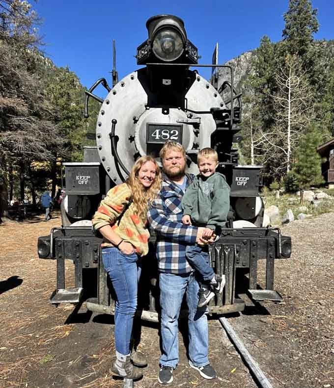 Nothing says perfect family memory quite like posing in front of a real steam locomotive numbered 482.