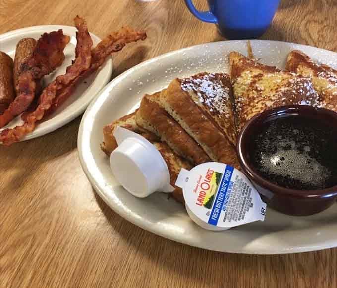 French toast with bacon and sausage, the holy trinity of breakfast that never goes out of style or disappoints.