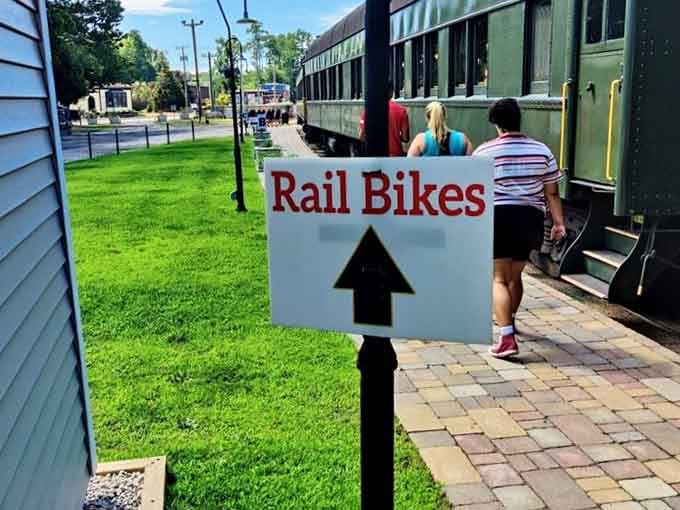 Follow the sign, find the adventure. The Rail Bikes arrow points toward one seriously unforgettable afternoon.