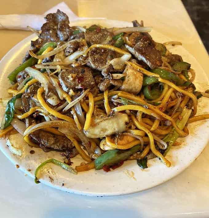 Savory beef and noodles stir-fried together in a way that makes your taste buds stand at attention.