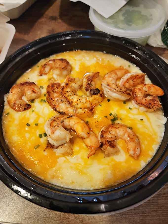 Shrimp and grits with enough cheese to make your cardiologist nervous but your taste buds ecstatic.