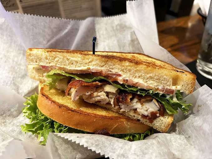 The Turkey Club, golden-toasted and stacked with care, is the kind of sandwich that makes you cancel your afternoon plans.