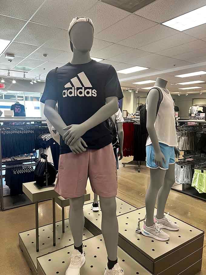 Adidas sportswear displayed like athletic art, making you believe you might actually use that gym membership this year.