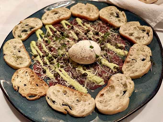 Thinly sliced beef carpaccio fanned out with capers, soft boiled egg, and chive aioli. Elegant doesn't have to mean complicated.