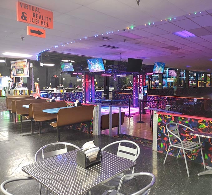Signs pointing to virtual reality and laser maze, because apparently one adventure at a time isn't enough here.