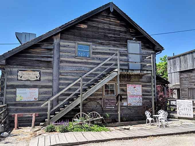 The Coffee Cabin's rustic wooden exterior practically whispers, "Come in, sit down, slow down."