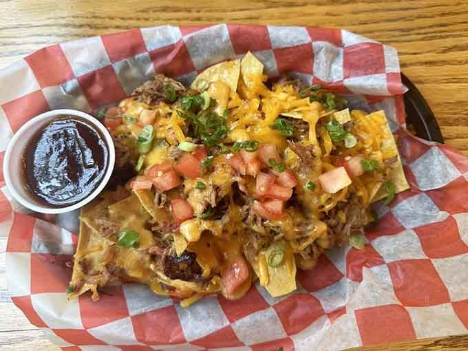 Cheese nachos piled high with all the fixings, because sometimes simple pleasures are the best pleasures of all.