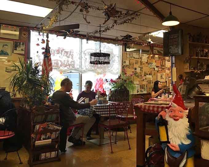 Regulars settle in among the gnomes and newspaper clippings, proof that good food builds loyal crowds.