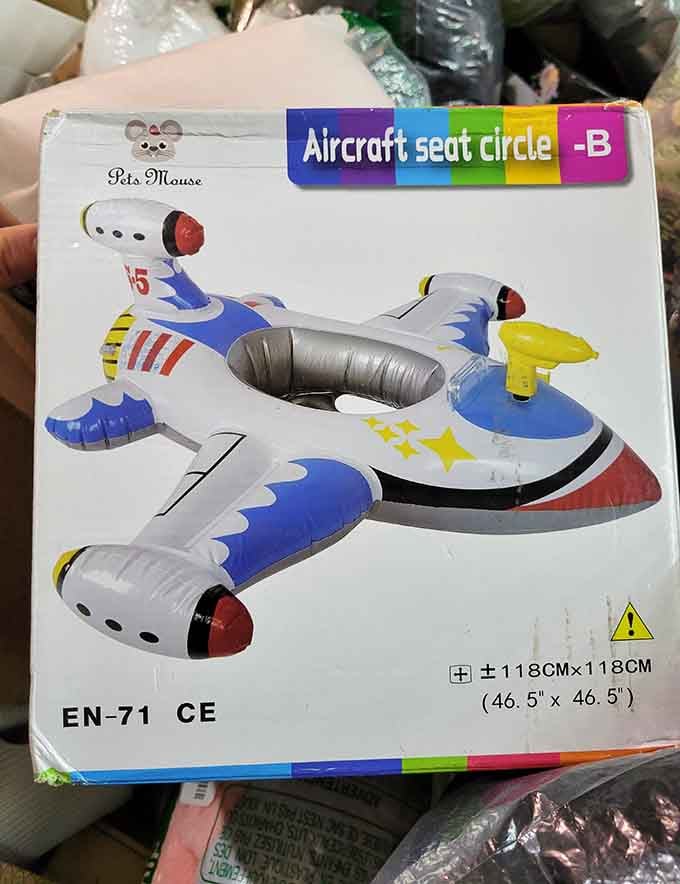 An inflatable airplane pool float that absolutely nobody expected to find today, and yet here we are, completely delighted.