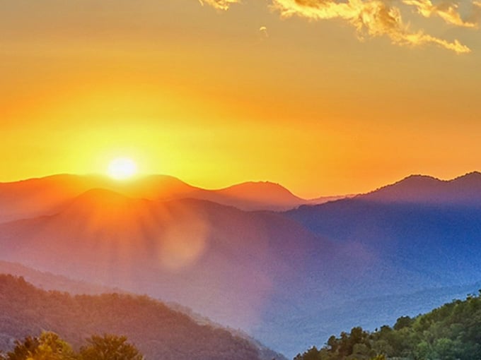 The sun clocking out over the Blue Ridge is the kind of farewell that makes you want to stay just a little longer.
