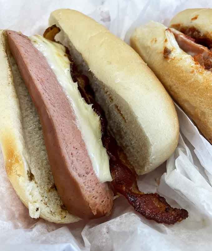 Bacon and cheese elevate a hot dog to gourmet status without the gourmet attitude or price tag.