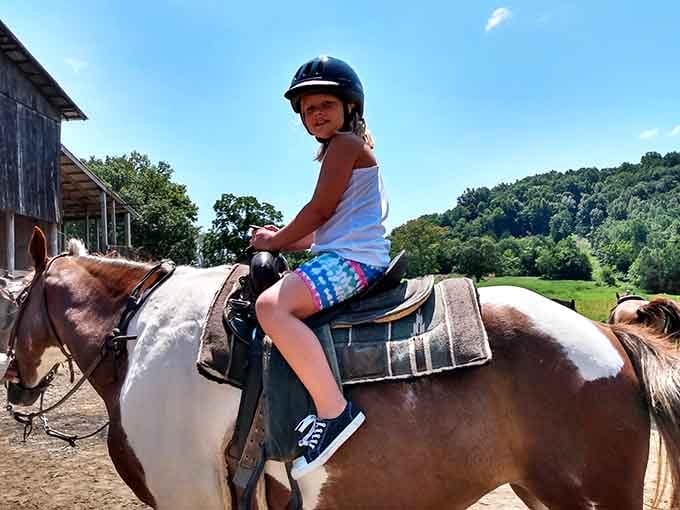 First time on a horse, helmet on, grin locked in, and a memory that'll last decades.