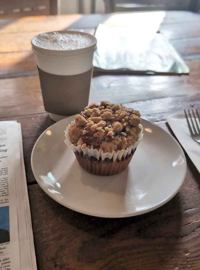 Streusel-topped blueberry muffin paired with a frothy latte makes for the kind of breakfast that fixes everything wrong.