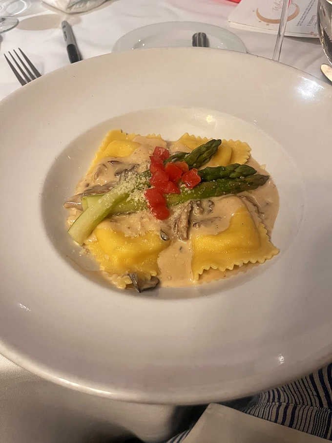 Ravioli with mushrooms, asparagus, and bright tomato. A bowl of pure comfort that somehow also looks like a painting.