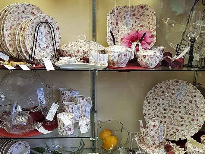 Floral chinaware stacked with quiet elegance, the kind your aunt brought out only for very special guests.