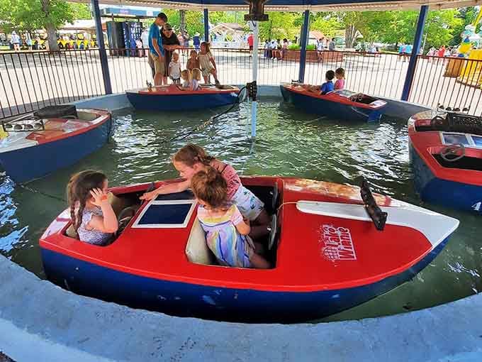 Little captains steering their red and blue boats with absolute authority, future admirals are clearly being trained here.
