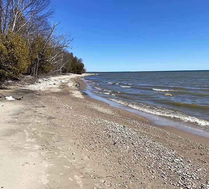 Rocky, quiet, and completely unhurried. This shoreline has absolutely no interest in your schedule, and honestly, good for it.