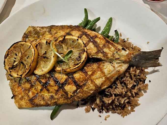 This Branzino arrived with grilled lemon slices and the quiet confidence of a fish that knows it's good.