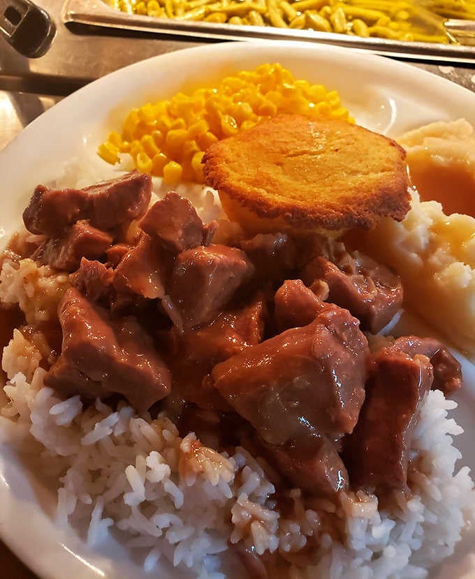 That rich, savory gravy soaking into fluffy white rice is the kind of thing dreams are made of.