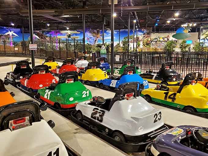 A rainbow lineup of go-karts sitting at the ready feels like the starting grid of pure childhood joy.