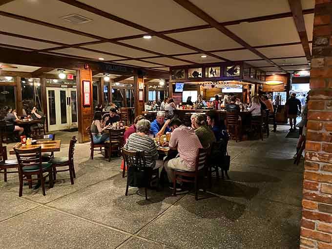 A full dining room buzzing with happy people. Marshside Grill at night has its own special energy.
