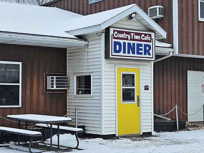 Even under a blanket of snow, that yellow door still manages to look like the best idea you've had all week.