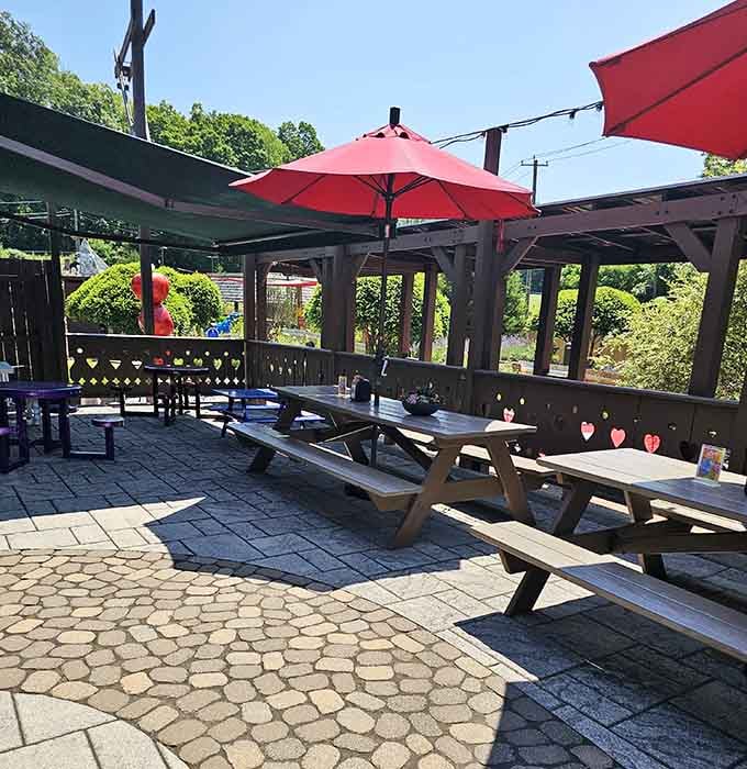 The shaded seating area says, "Sit down, relax, and let the kids tire themselves out for once."