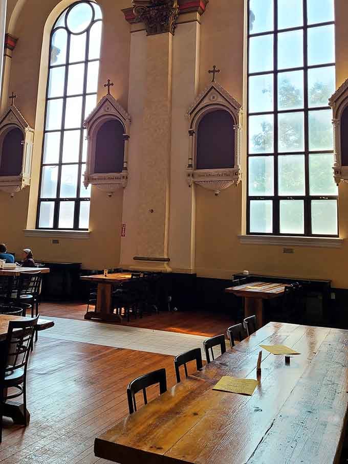 Arched niches and towering windows create the kind of ambiance most breweries can only dream about achieving.