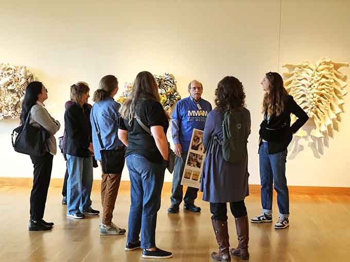 A knowledgeable guide sharing stories with a small group. This is how art becomes something you actually remember afterward.