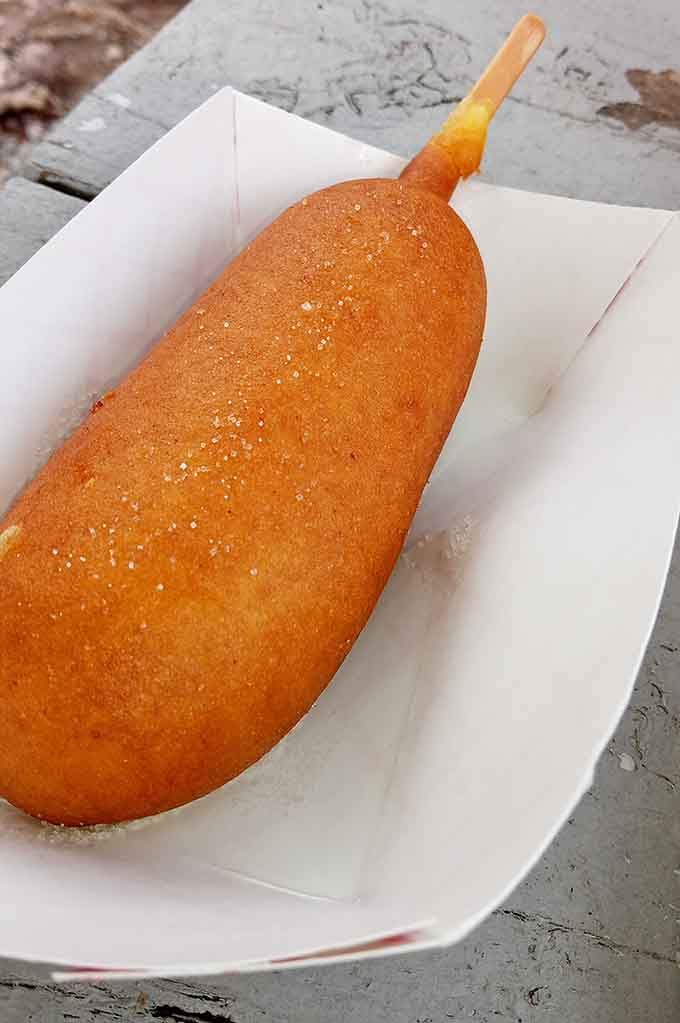 The golden-fried corn dog on a stick: classic fair food done right, any day of the week.