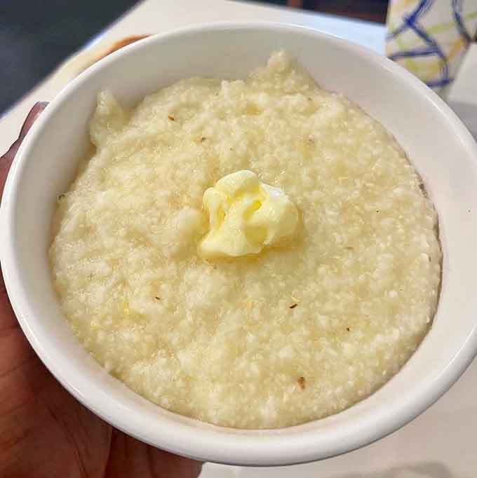 A bowl of buttered grits so smooth and warm, it feels like a hug you didn't know you needed.