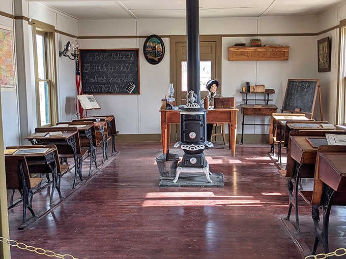 Wooden desks and a pot-bellied stove create the perfect setting for appreciating your own educational experience retrospectively.