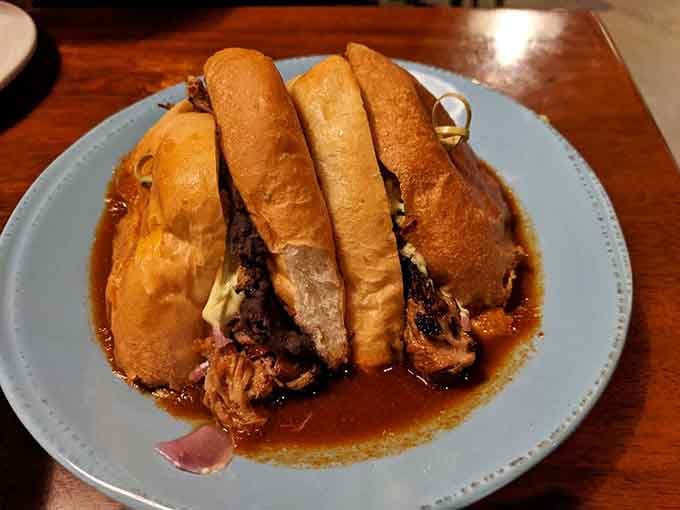 A torta so generously sauced it requires full commitment. This is not a first-date sandwich. This is a trust-fall sandwich.