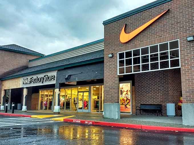 Nike's giant swoosh glows like a beacon calling athletes and couch potatoes alike to find their perfect shoes.