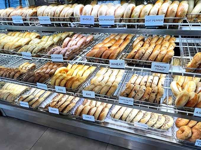 Sunflower raisin, blueberry, French toast, chocolate chip. This bagel wall is basically a greatest hits album you can eat.