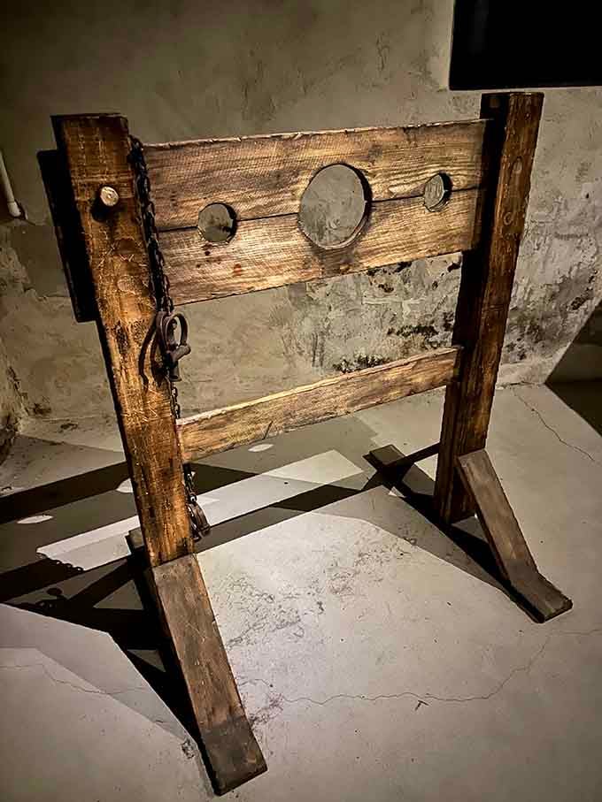 A wooden stock with chains attached. Colonial justice was, shall we say, extremely hands-on.