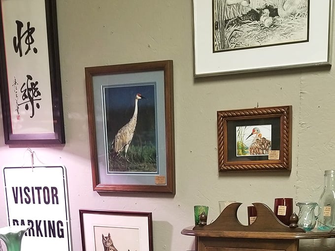 Art, wildlife prints, and a vintage parking sign walk into a booth. No punchline needed here.