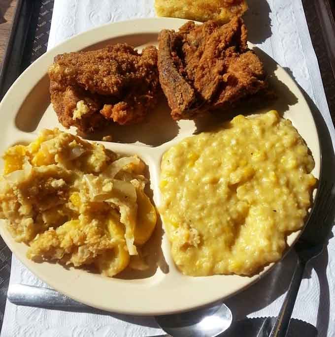 Fried chicken, squash casserole, and creamed corn on one tray. This plate is basically a Southern greatest hits album you can eat.
