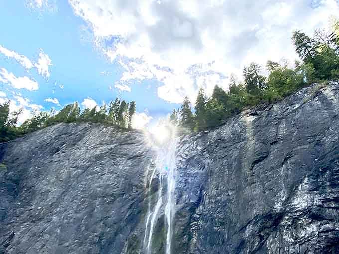 Standing directly beneath 233 feet of falling water puts your entire perspective on life into sharp, refreshing focus.