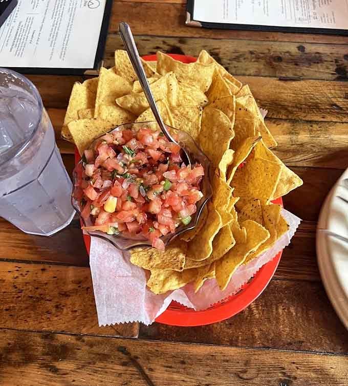 Homemade pico de gallo, made fresh daily, piled high with yellow corn tortilla chips. The perfect warm-up act.