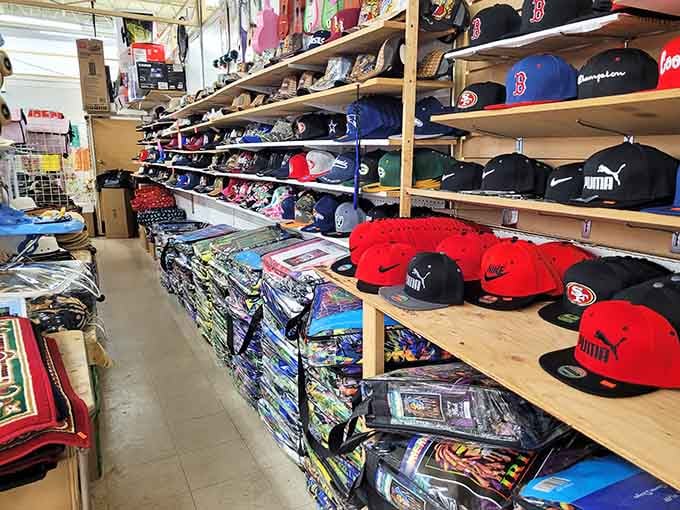 Sports caps and branded hats organized like a collector's dream, where team spirit doesn't cost a season ticket.