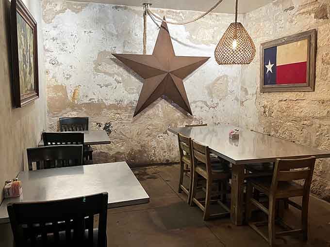 A rustic Texas star watches over your meal in this cozy corner of underground Fredericksburg dining history.