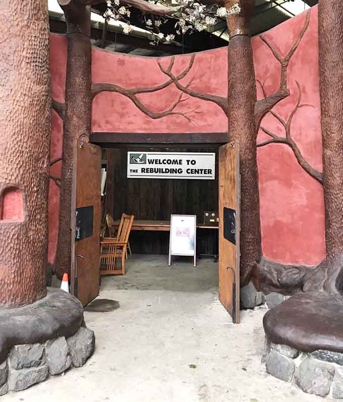 The whimsical tree-trunk entrance to the ReBuilding Center, where Portland's love of creativity meets practical salvage magic in one unforgettable doorway.