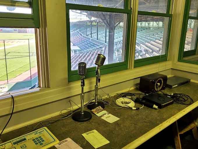 Vintage microphones in the announcer's booth&mdash;because sometimes the old technology just sounds better than whatever's trending on TikTok.