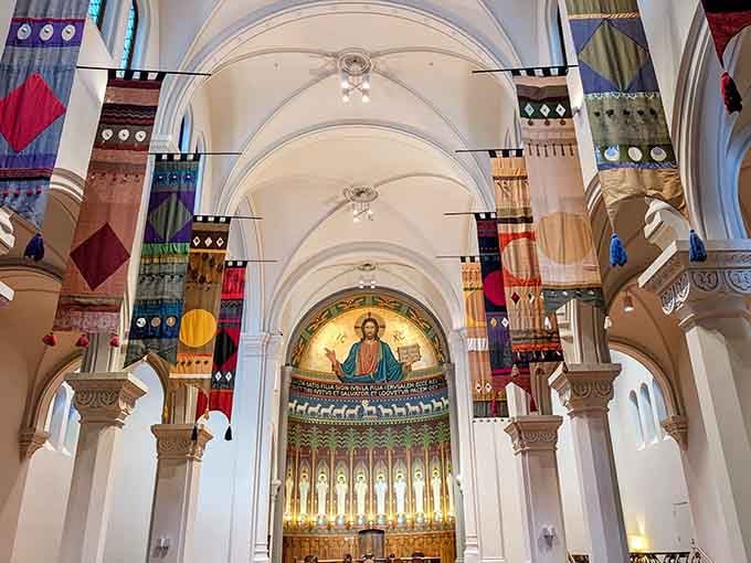 These colorful banners transform the space into something between a medieval feast hall and a really sophisticated art installation.