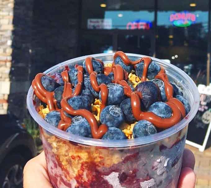 Fresh blueberries, a drizzle of chocolate, and layers of goodness underneath. This acai bowl is no afterthought.